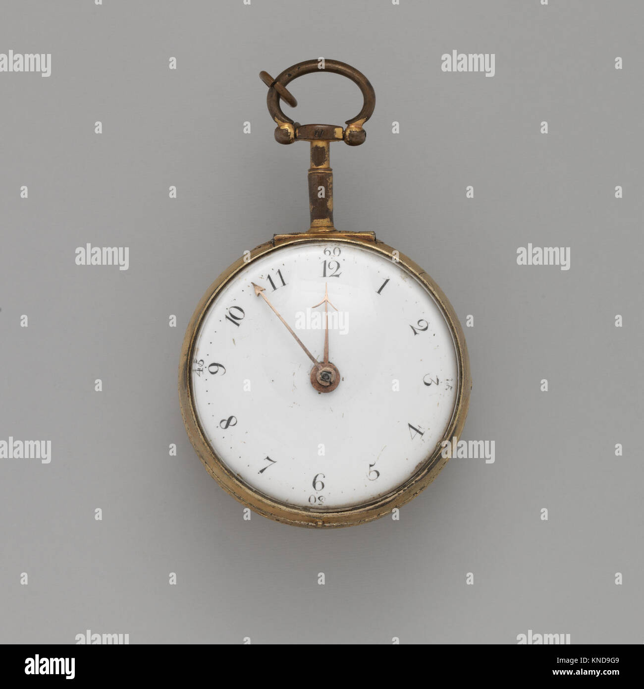 This clock-watch demonstrates intricate timekeeping technology, fine ...