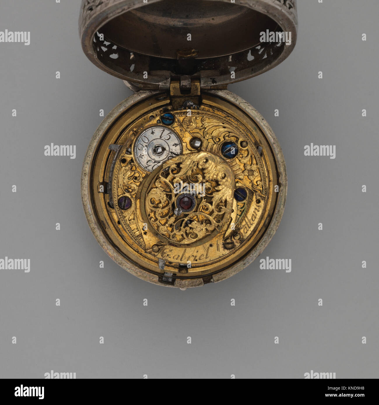 This clock-watch combines timekeeping and jewelry design, demonstrating ...