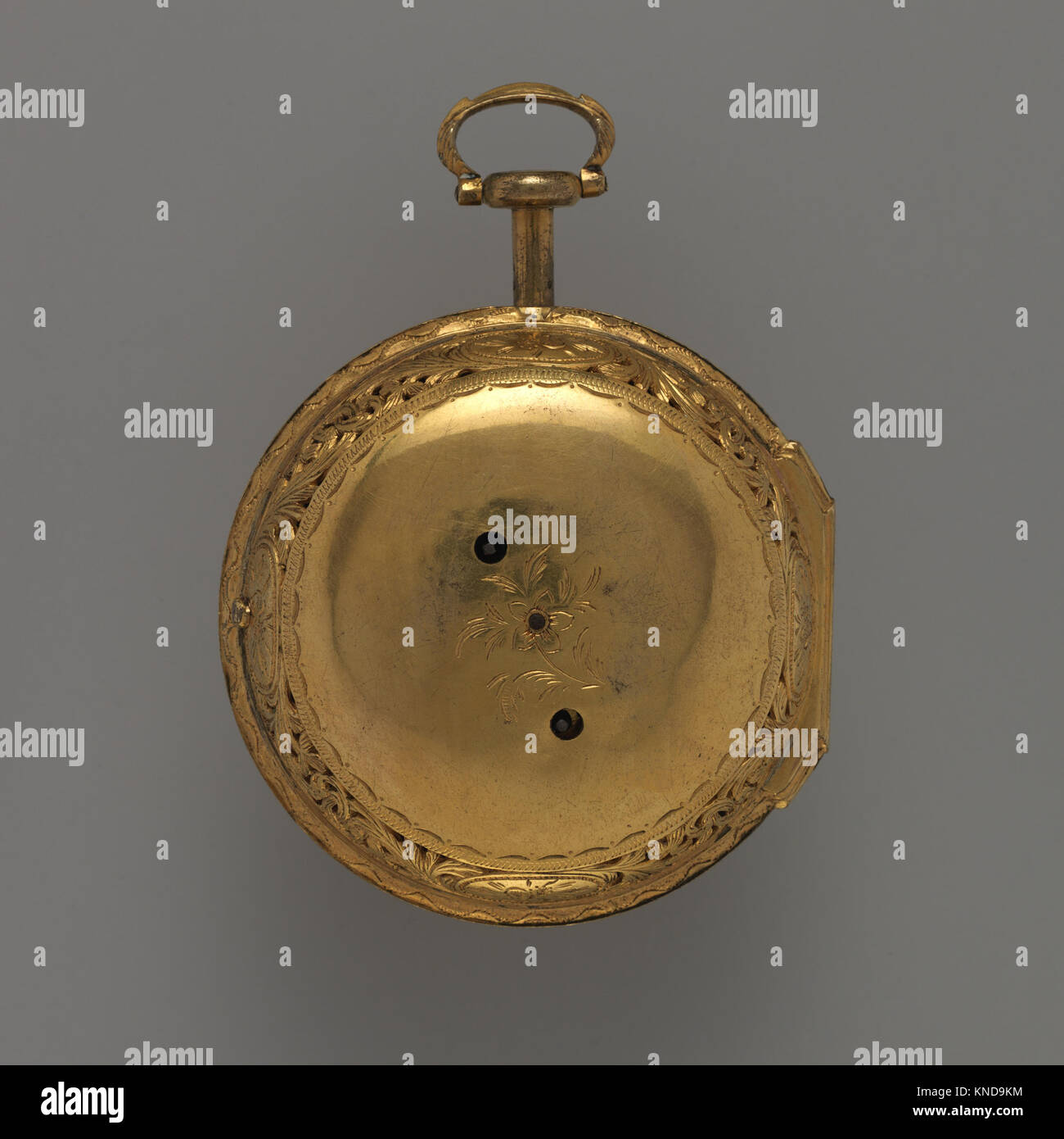 This clock-watch is a fusion of timekeeping and decorative art. Its ...
