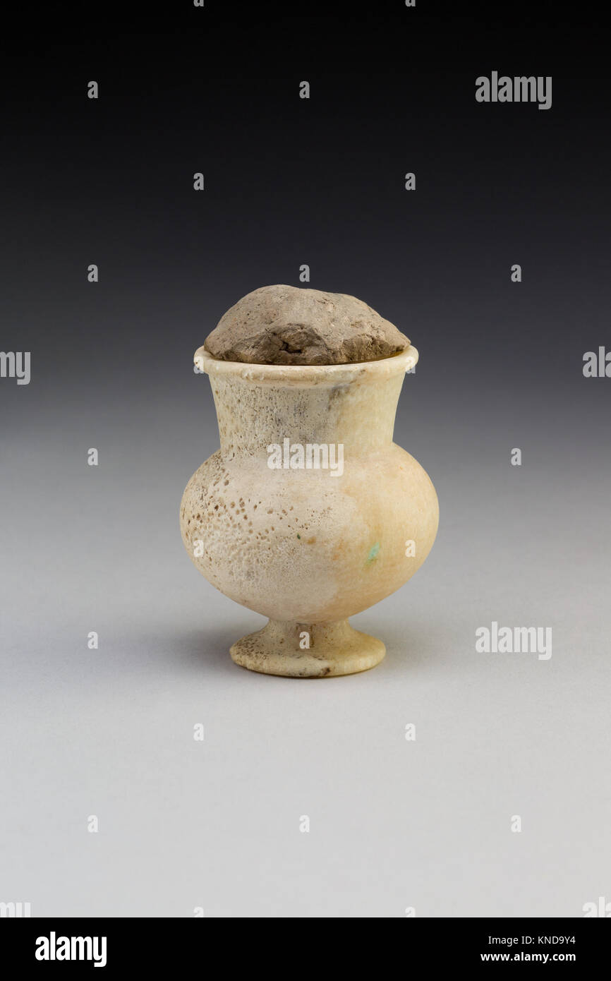 This ancient cosmetic jar with a mud stopper was used for storing ...