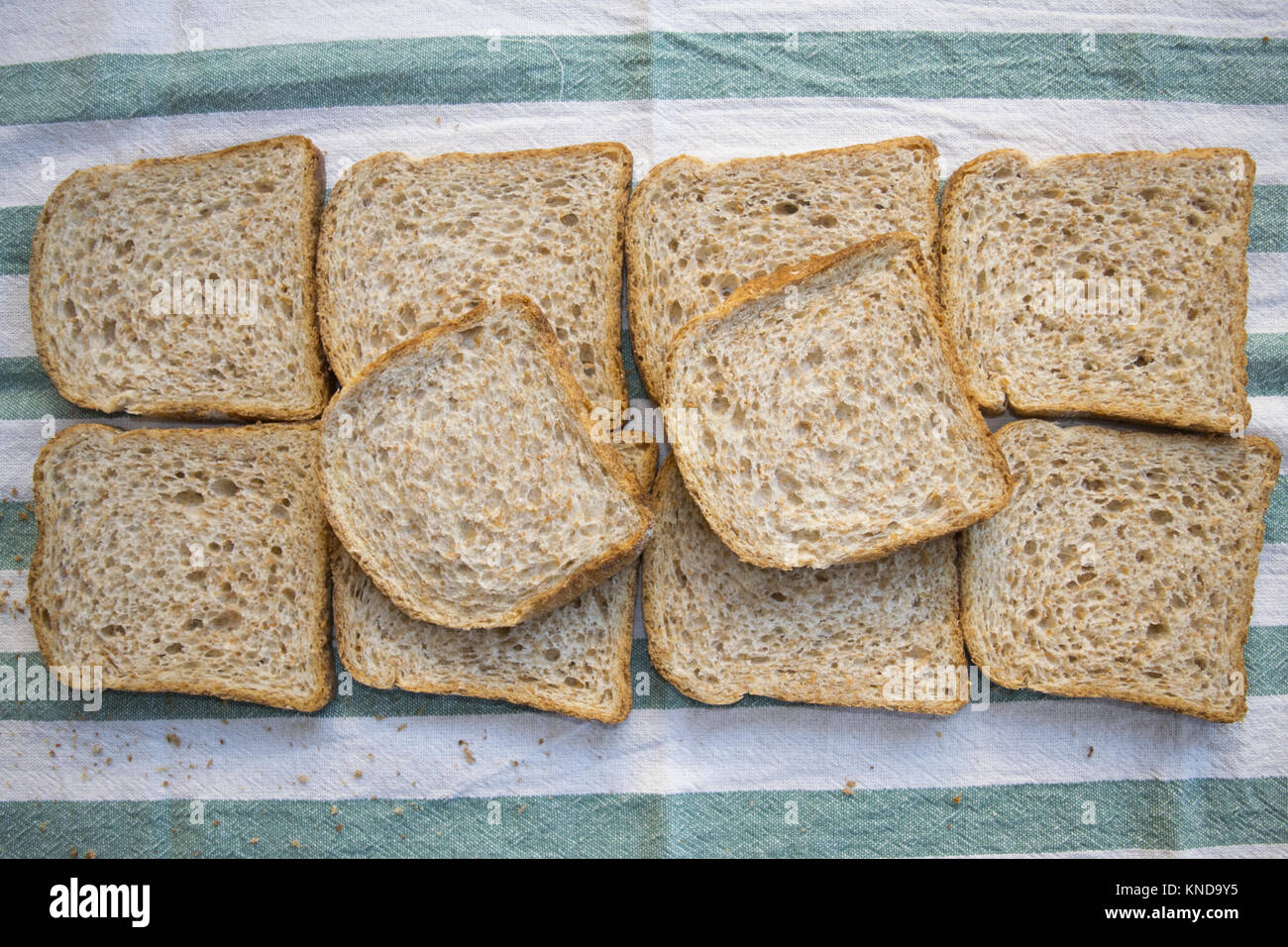 top view of an series of wholemeal bread to prepare sandwiches Stock ...