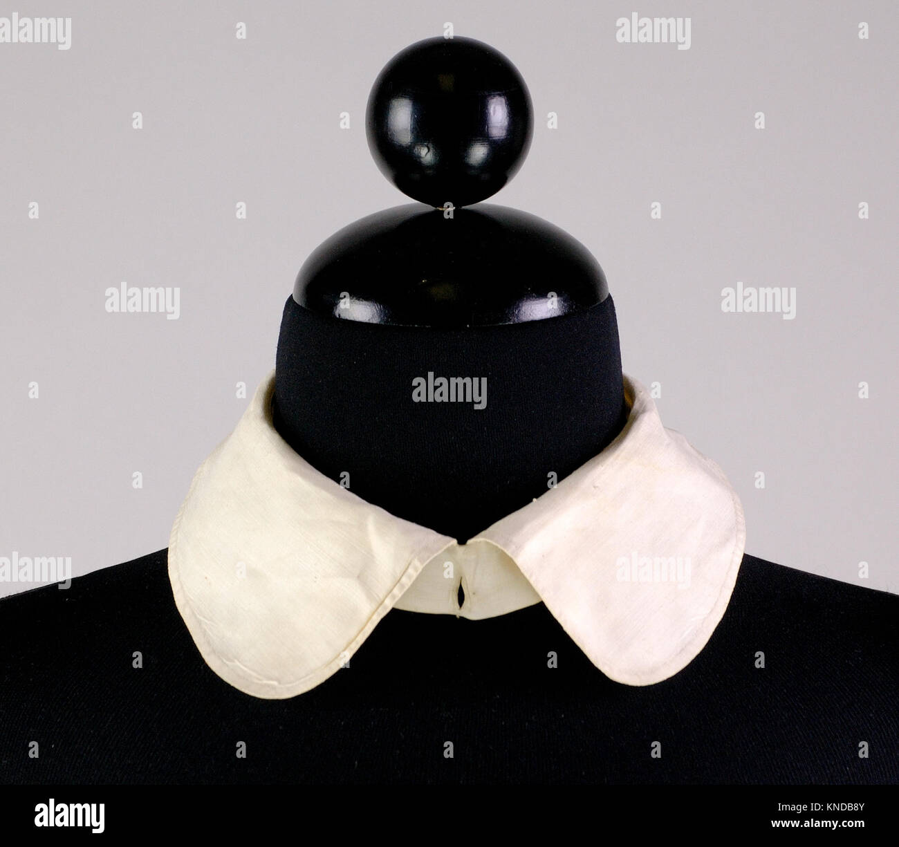 This item represents a collar, often part of historical or traditional ...