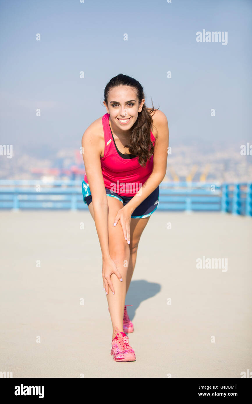 Beautiful girl bending down hi-res stock photography and images - Alamy