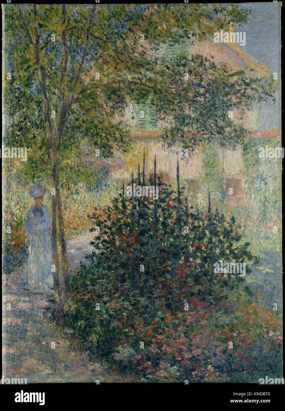 A painting of Camille Monet in the garden at Argenteuil by Claude Monet ...