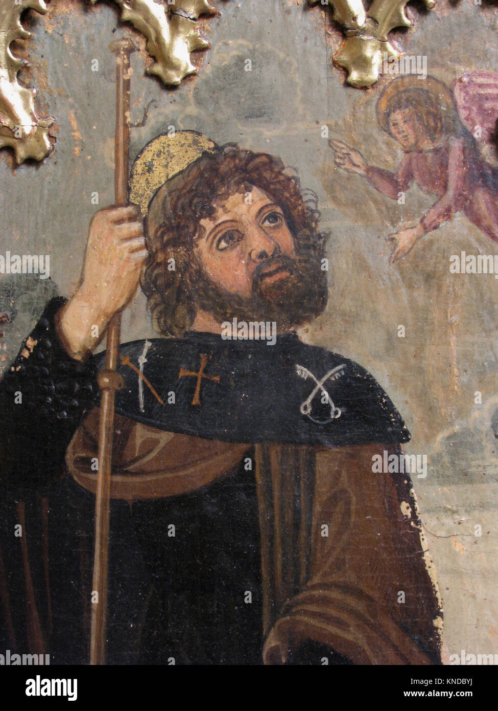 This altar shrine features depictions of four saints, a key element in ...