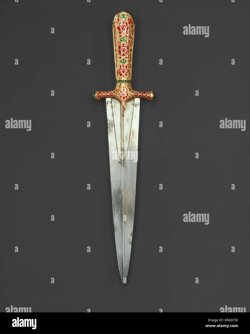 This dagger, complete with its scabbard, is a 17th-century weapon ...