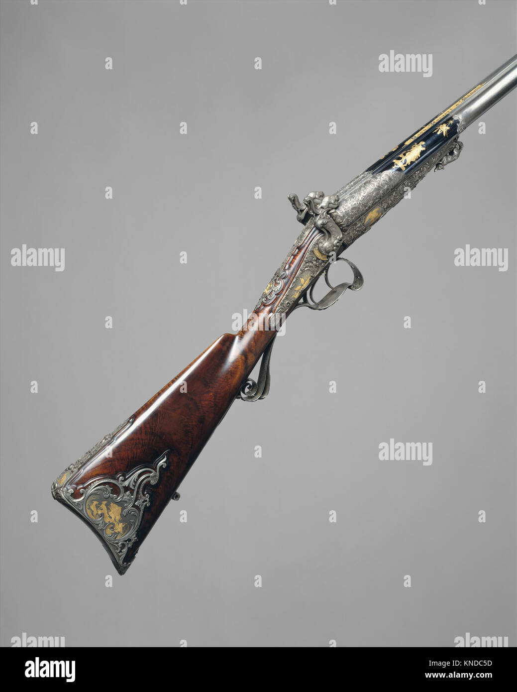 A double-barrel breech-loading pinfire shotgun, representing 19th ...