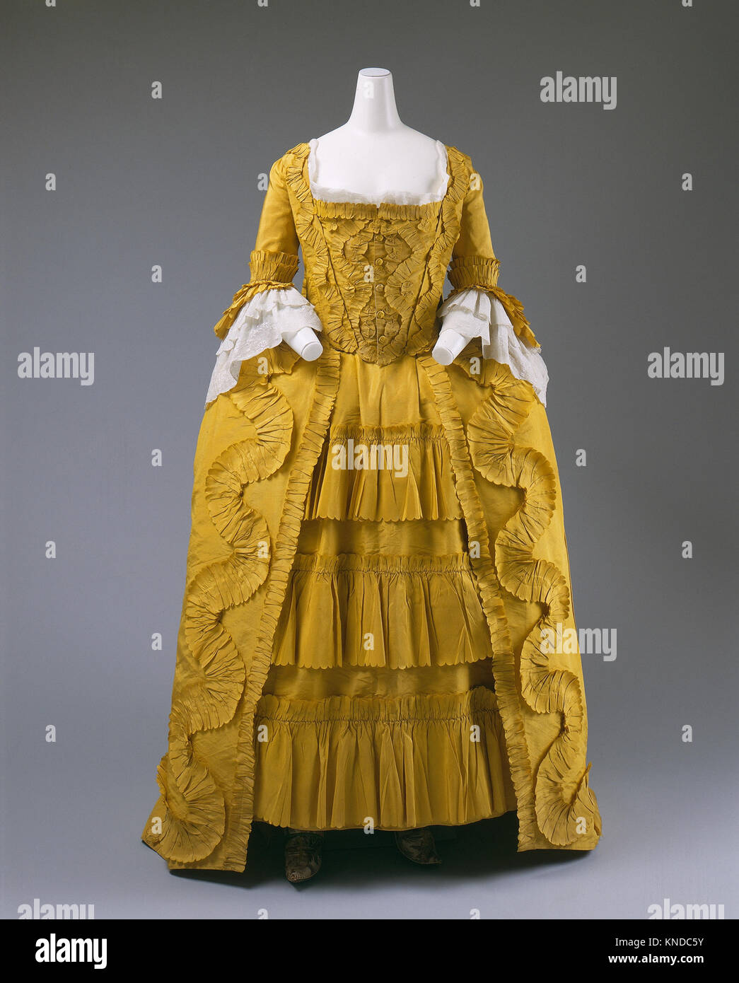 This dress is a historical garment, representative of fashion and ...