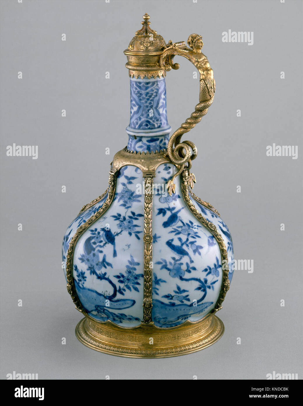 This ewer, an ancient ceramic vessel, features fine craftsmanship and ...