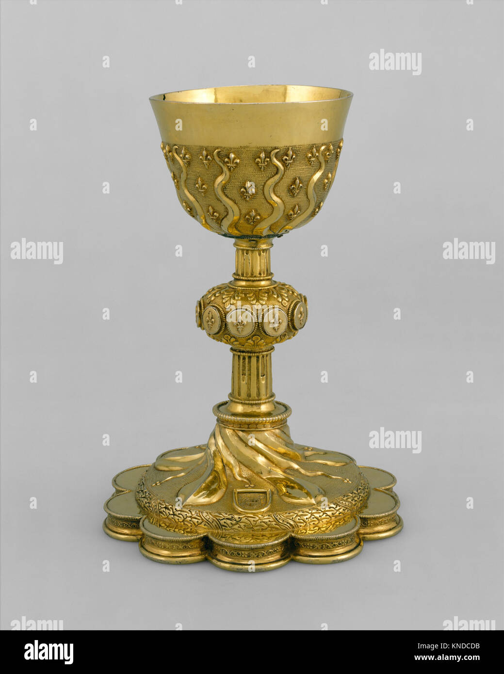 This chalice with a soleil design features intricate craftsmanship ...