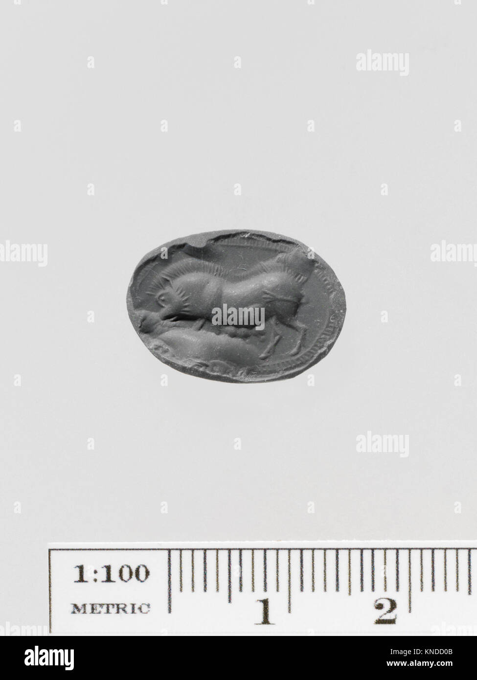 This small agate scarab, dating to approximately 550-500 B.C., is an ...