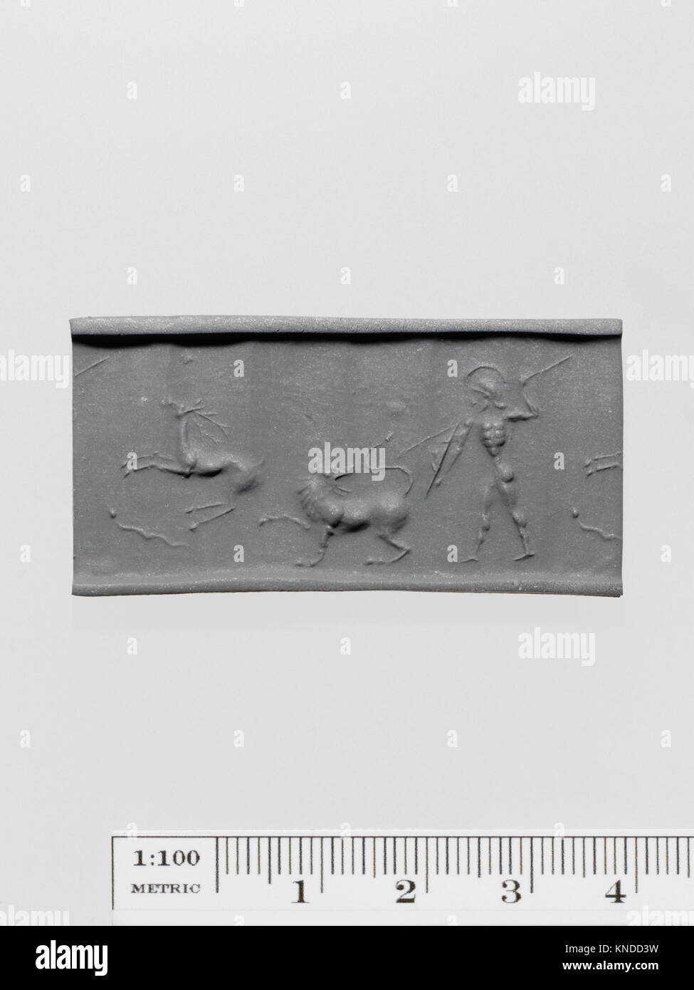 This black marble cylinder seal from 5th century B.C. Ionian Greece ...