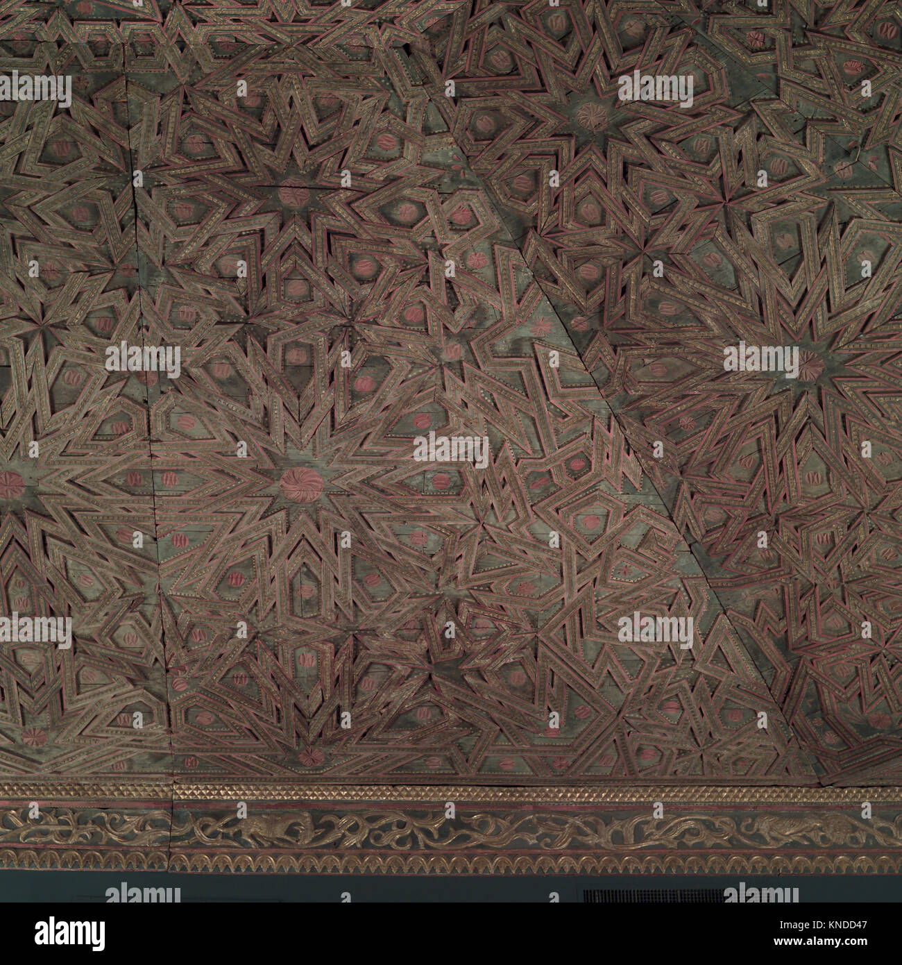 This ceiling design features intricate details typical of the period ...