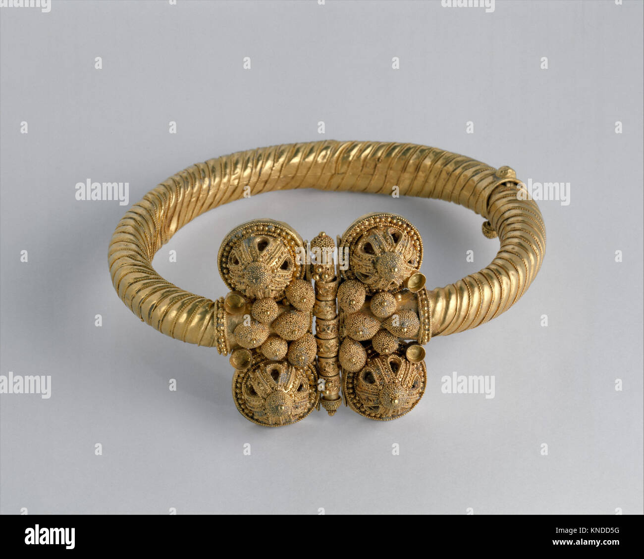 This armlet, an ancient jewelry piece, dates back to a distant ...