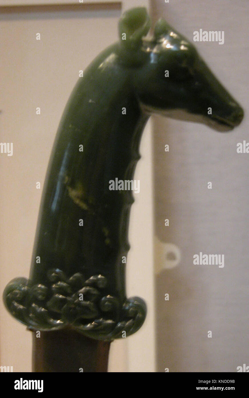 This dagger features a hilt shaped as a blue bull, combining functional ...