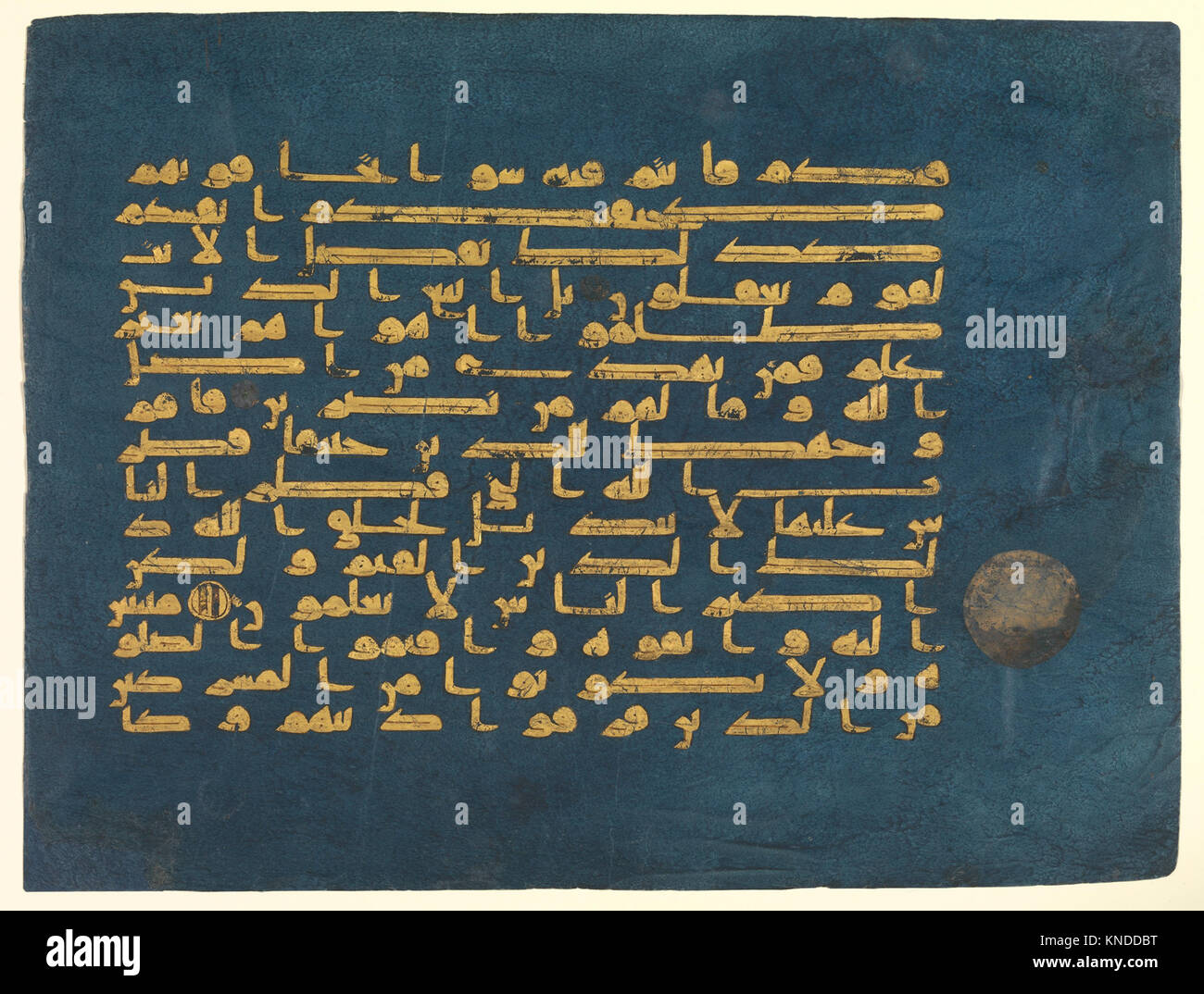 A folio from the Blue Qur'an, cataloged as MET DP297528, featuring gold ...