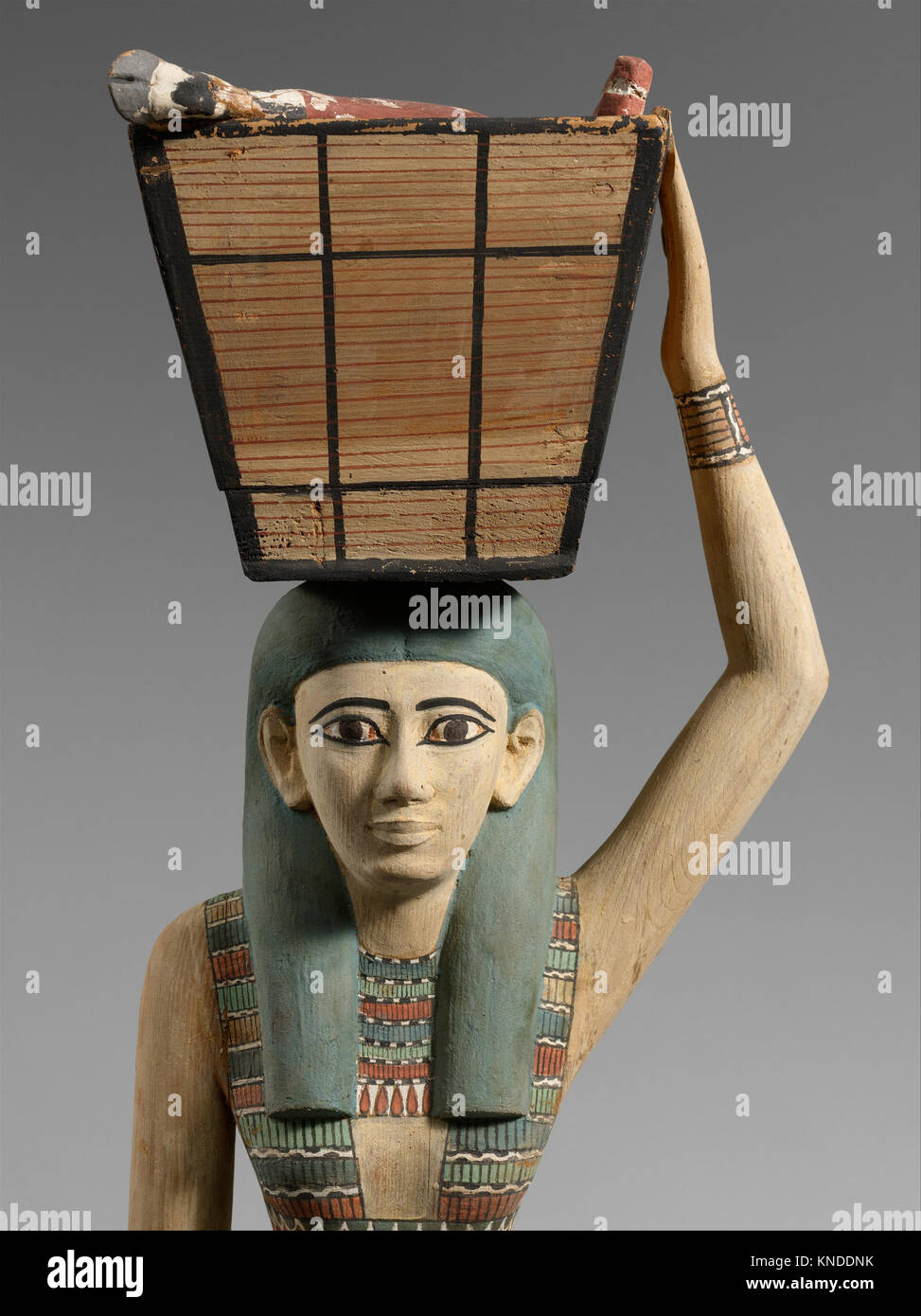 This estate figure represents a carved sculpture, possibly from the ...