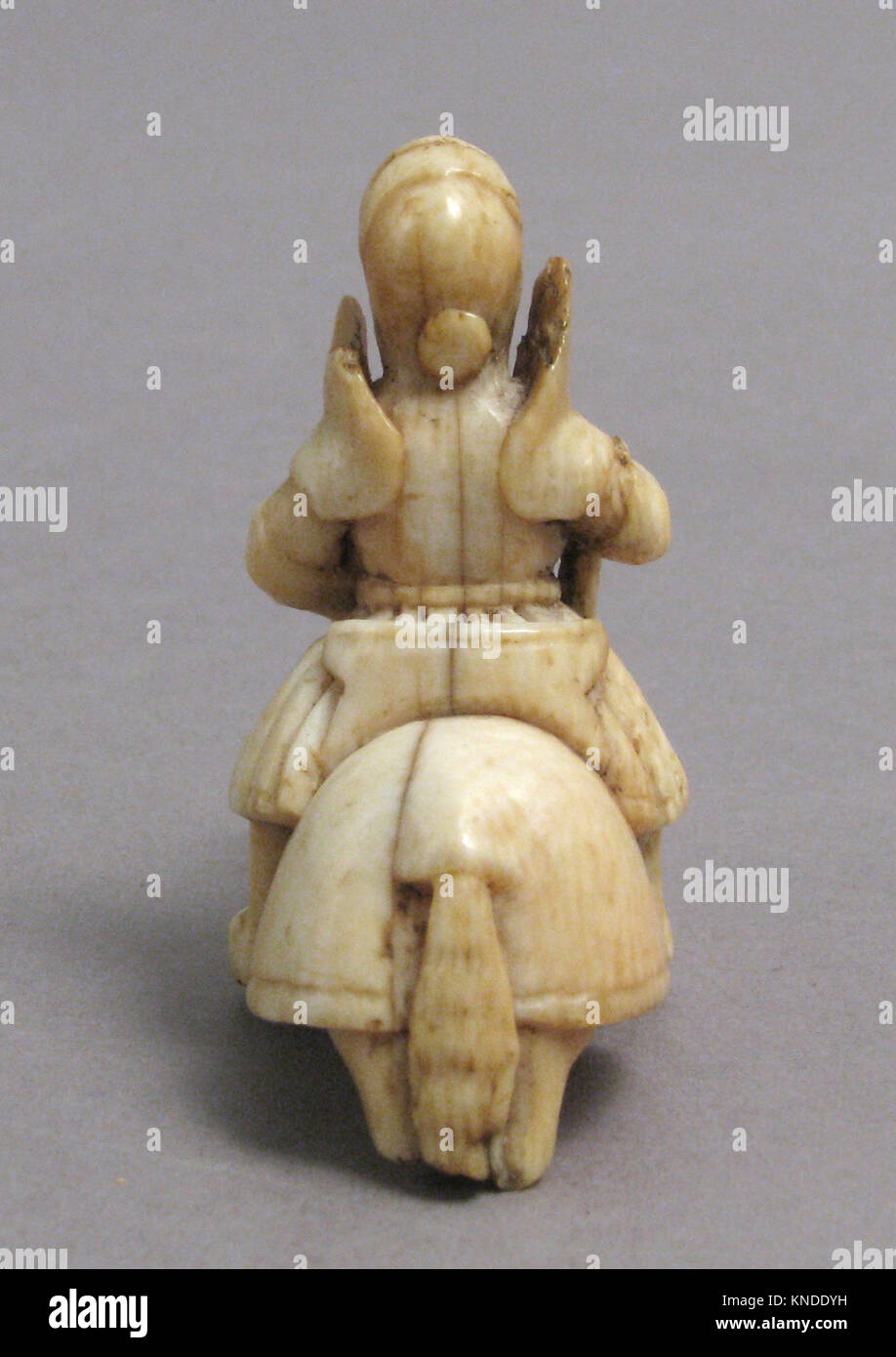 This chess piece, shaped as a knight, represents the detailed ...