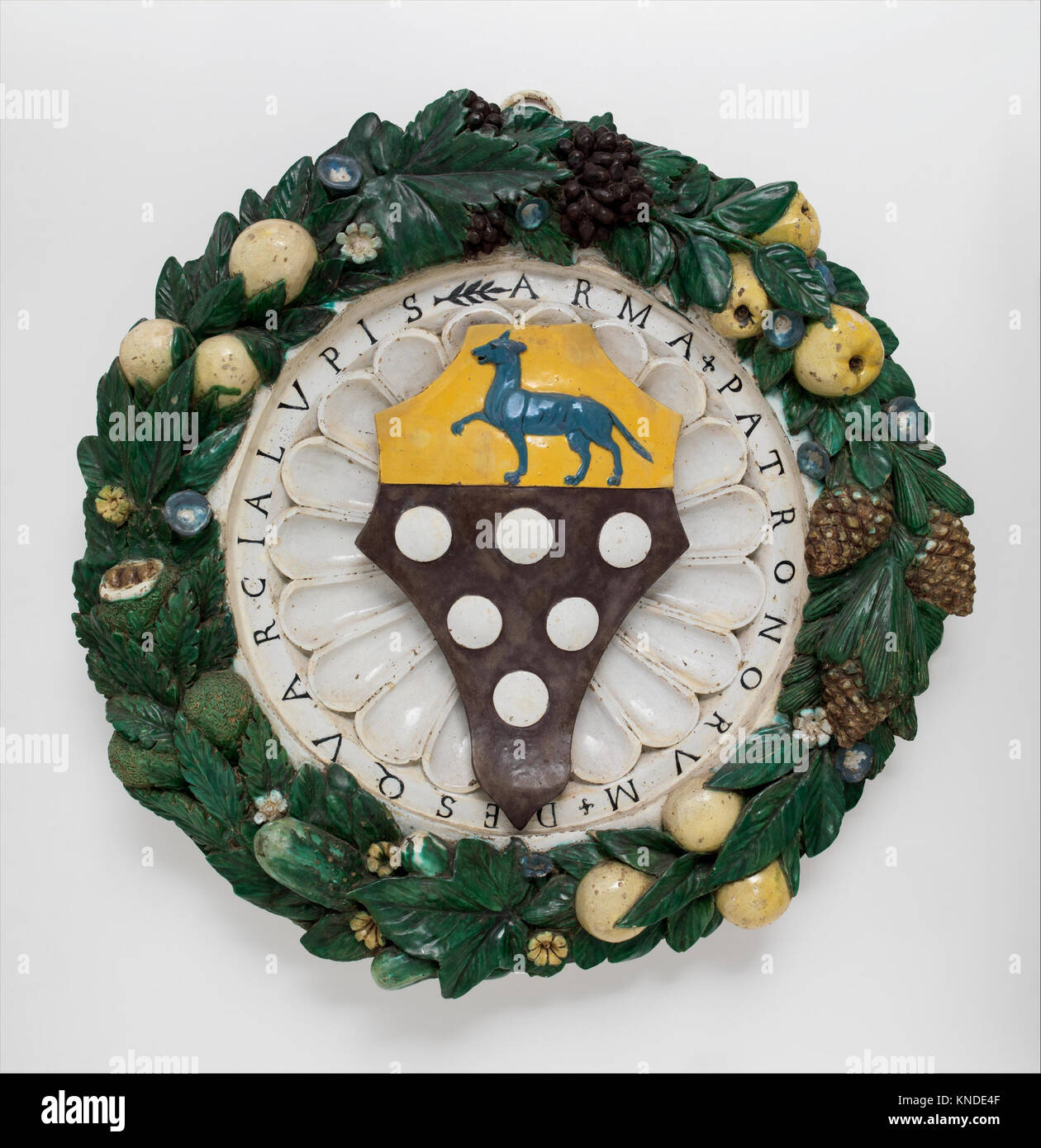 This armorial tondo displays the heraldic arms of the Squarci Lupi ...