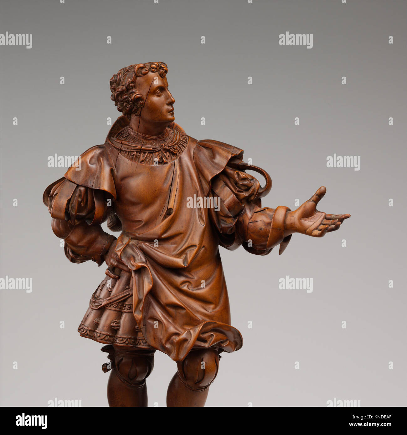 This group of statuettes represents various figures, each crafted with ...