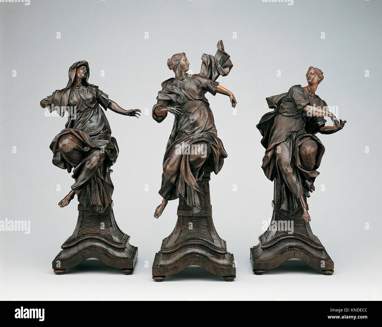 This artwork portrays allegorical figures of Faith, Hope, and Charity ...