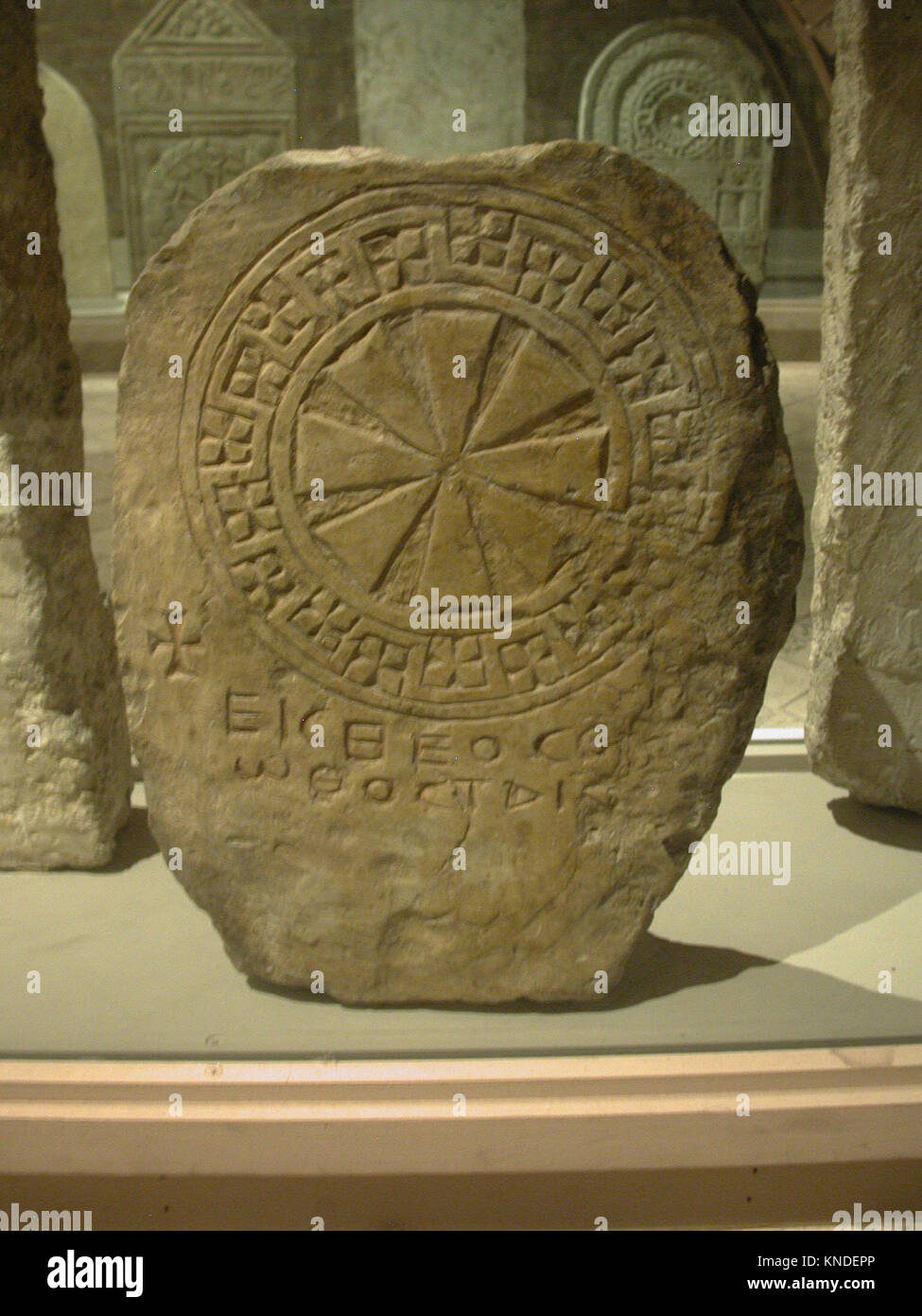 This funerary stele features a wheel pattern and is part of the MET ...