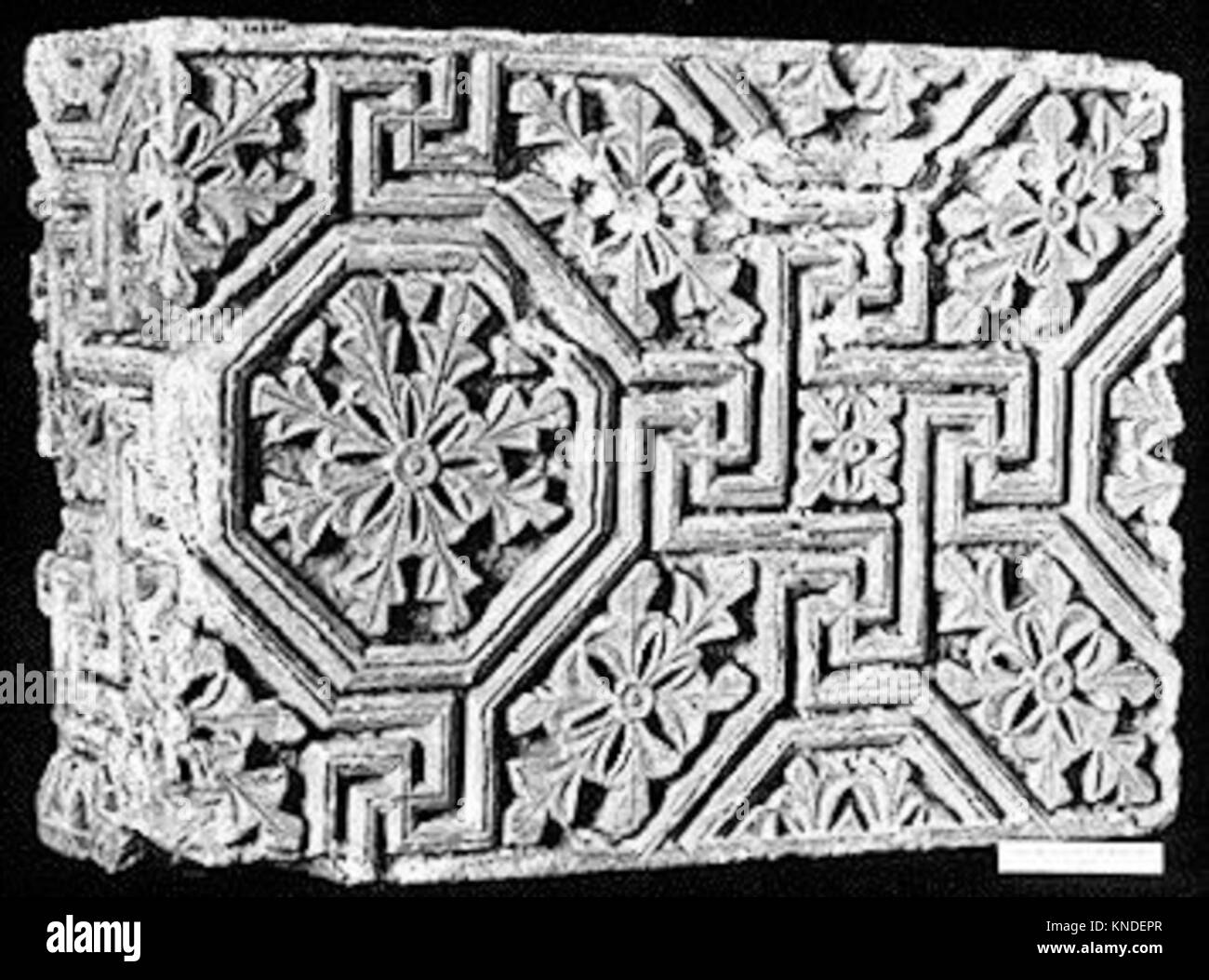 This frieze corner block displays a meander pattern with interlocking ...
