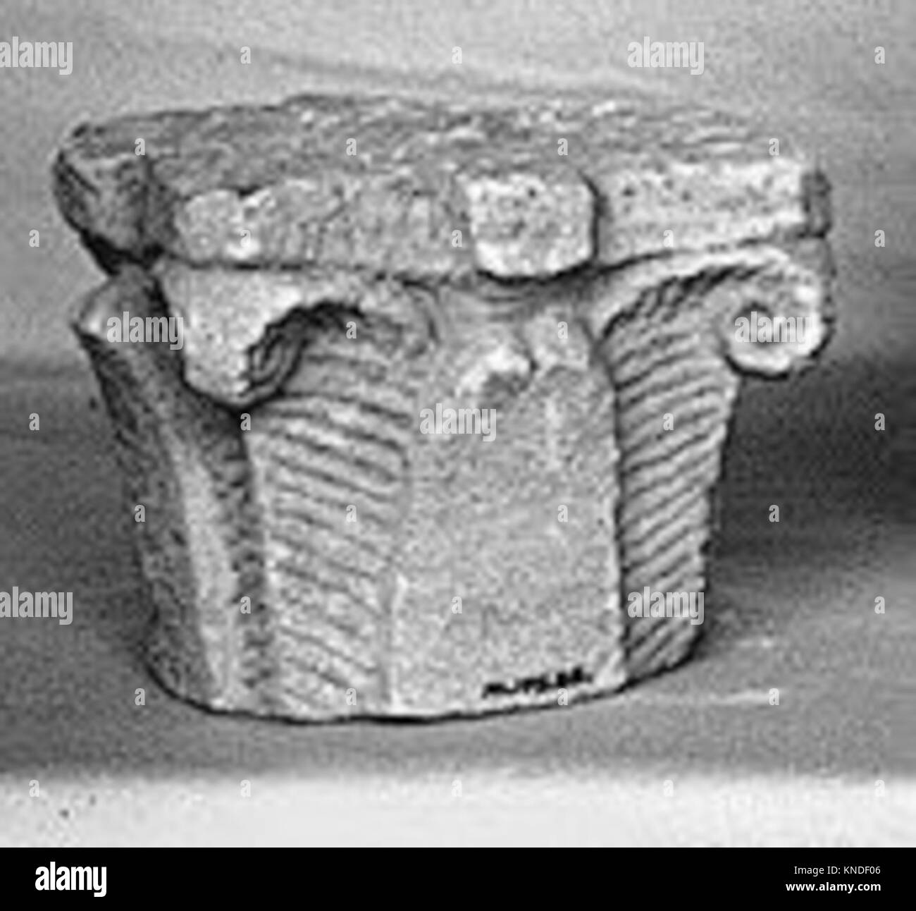 This capital, an architectural element, represents the uppermost part ...