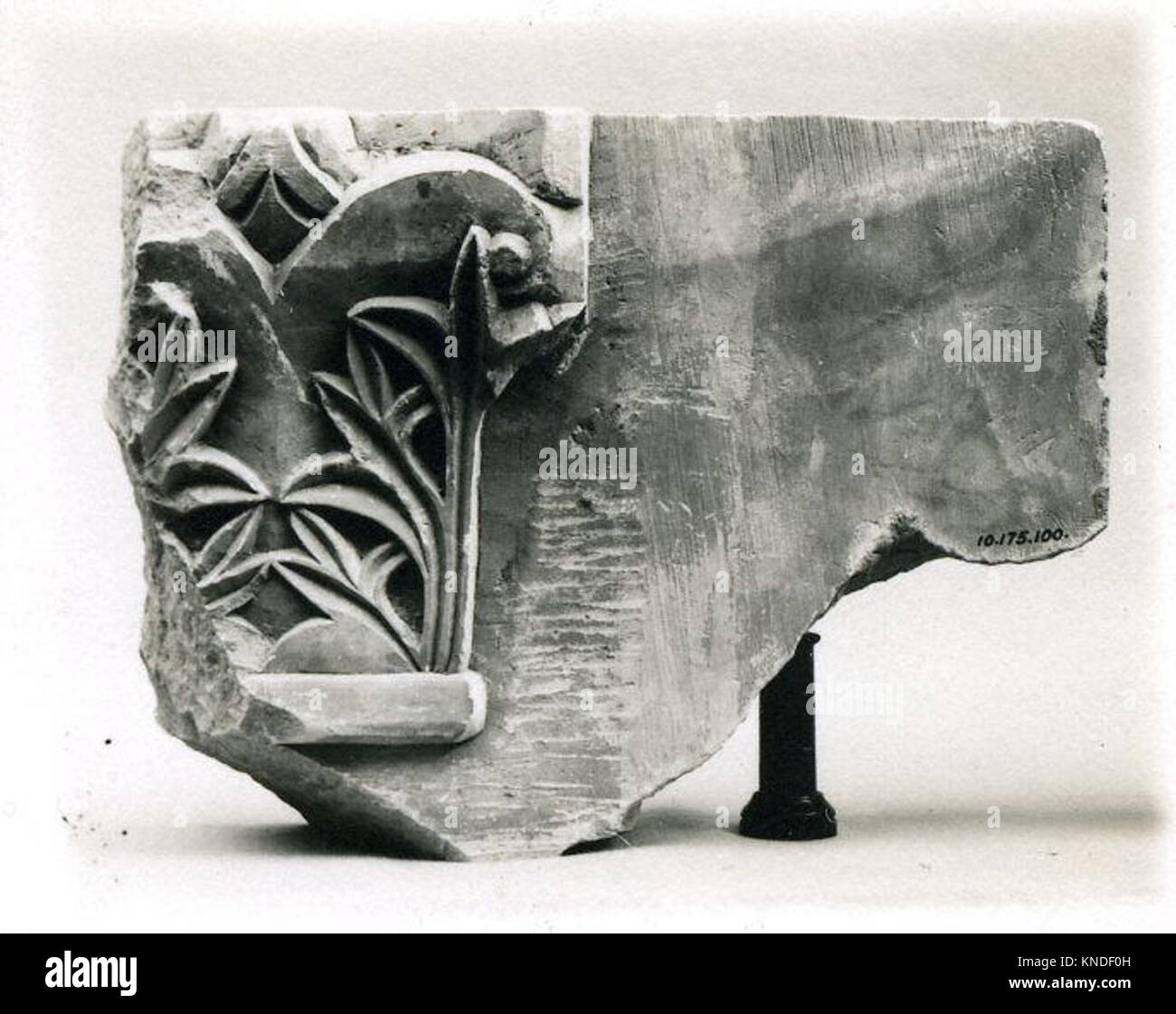 This sculptural capital from a column or pillar features detailed ...