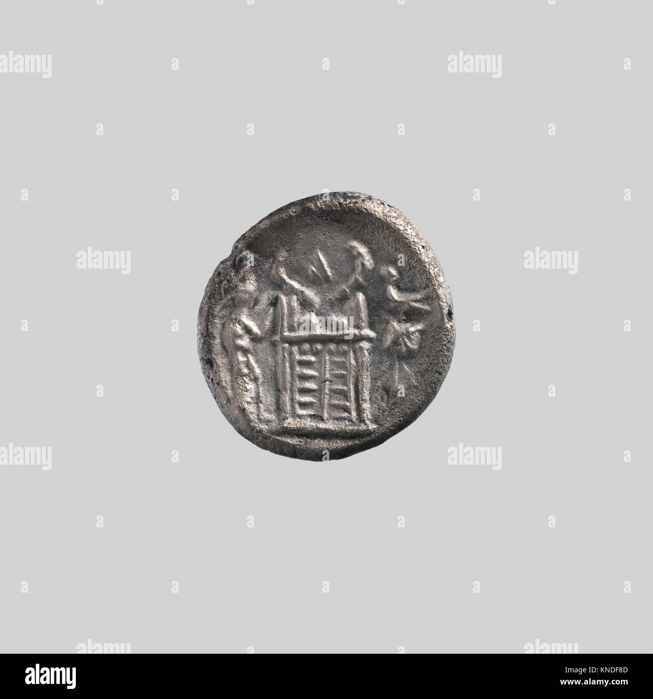 This drachm, a form of ancient coinage, is a representation of the ...
