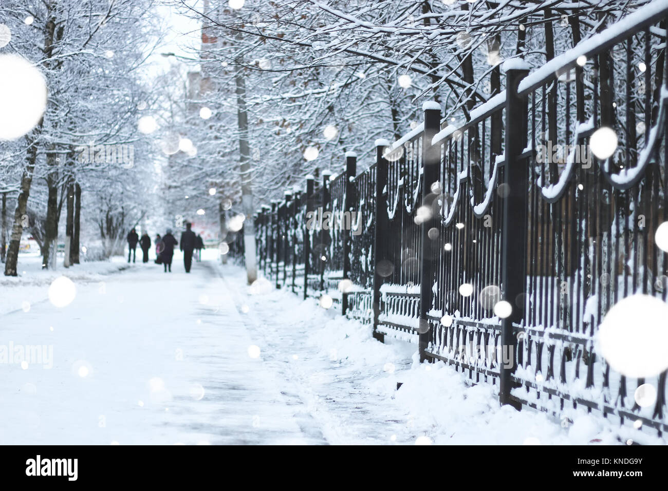 pedestrian sidewalk the fence winter Stock Photo - Alamy