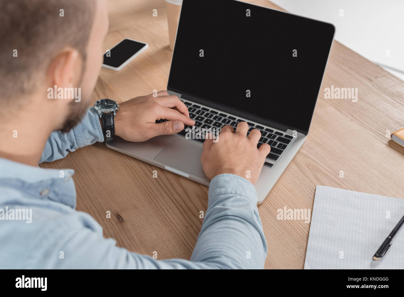 working with laptop Stock Photo - Alamy