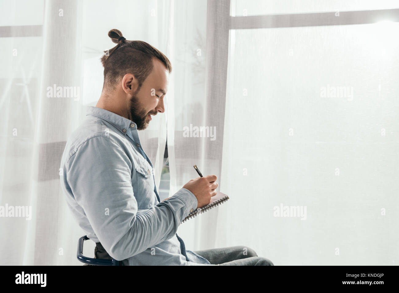 Man sitting in chair, top view hi-res stock photography and images - Alamy