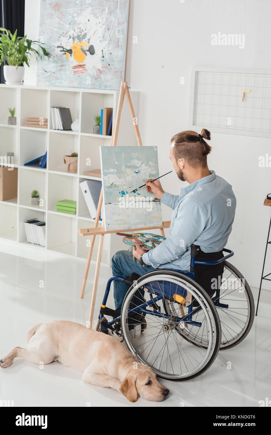 disabled man painting Stock Photo - Alamy
