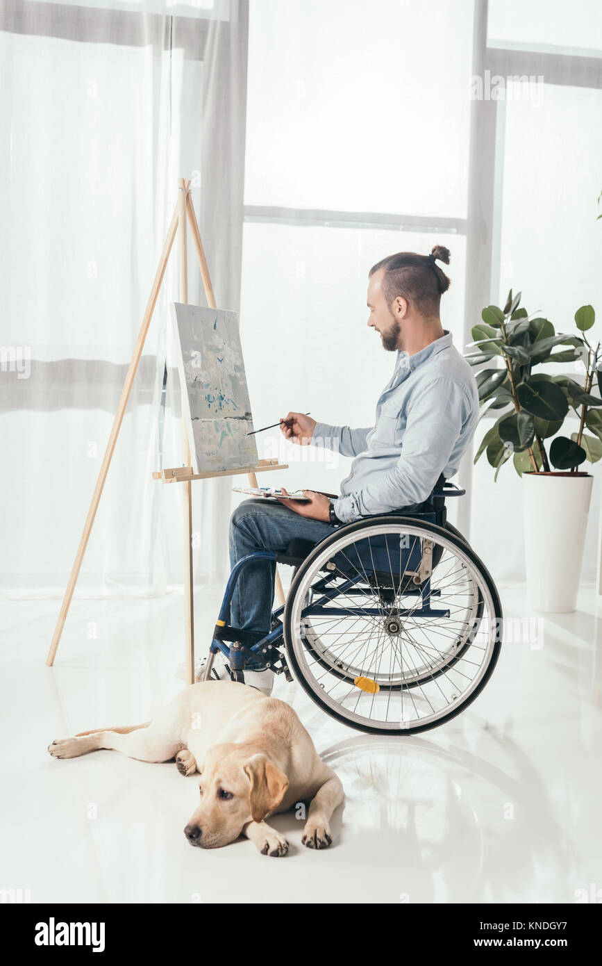 disabled man painting Stock Photo - Alamy