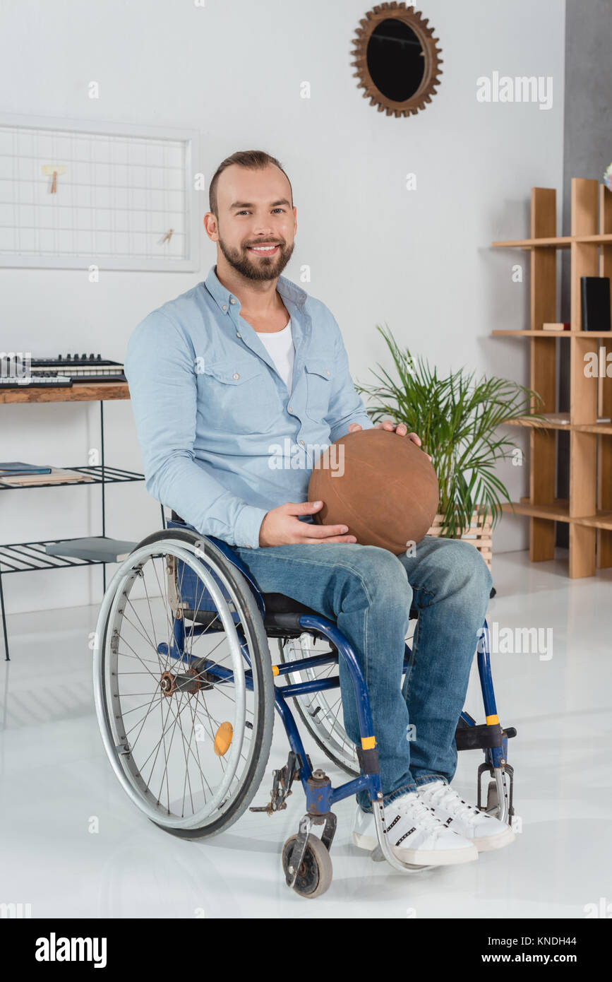 disabled man with basketball ball Stock Photo - Alamy