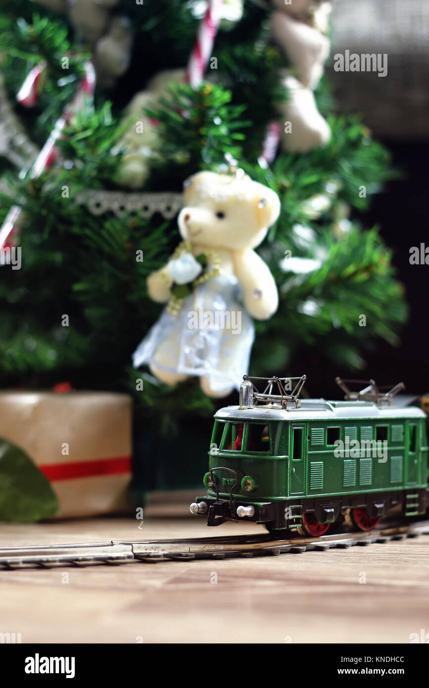 train under tree gift Stock Photo - Alamy