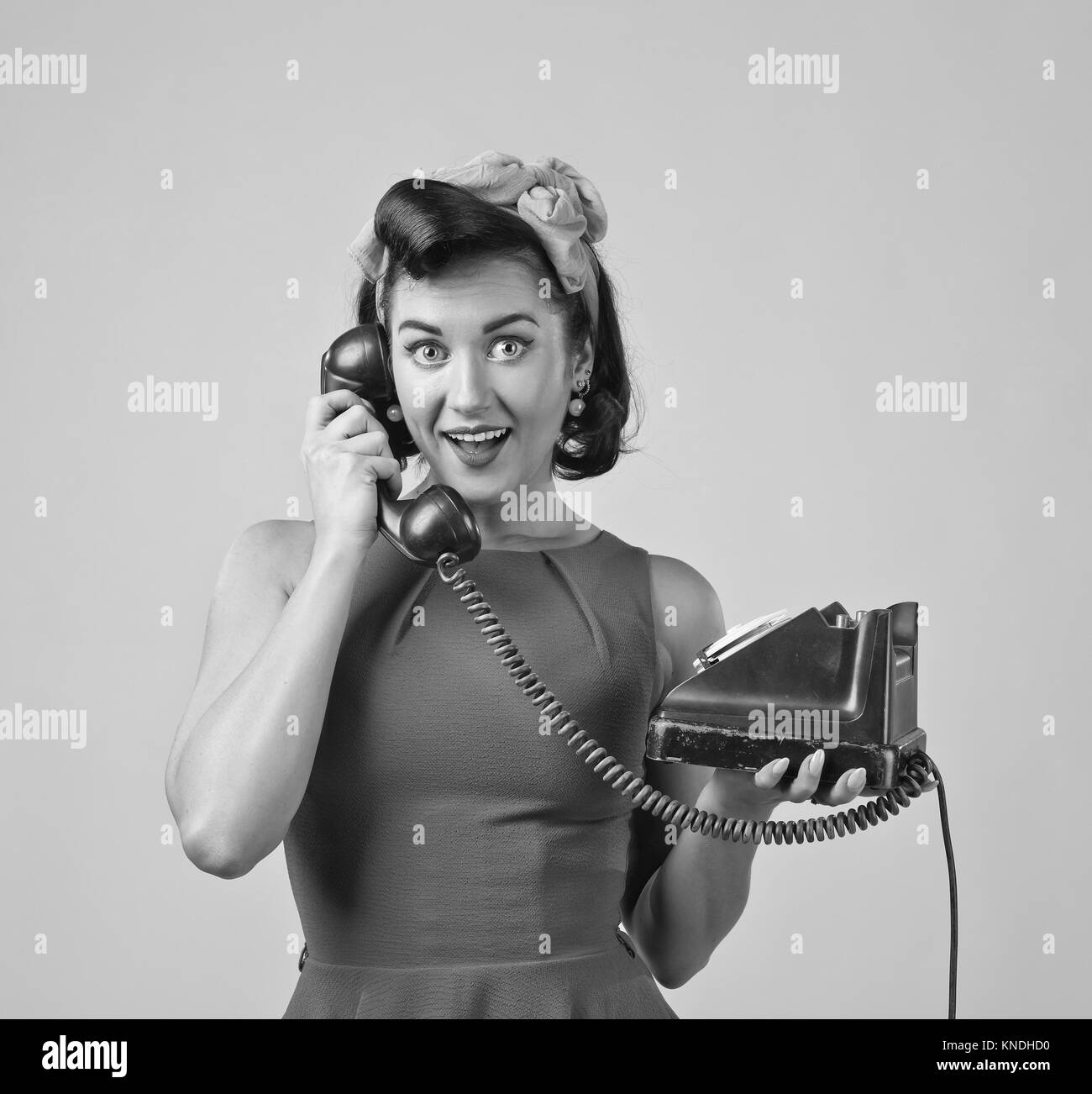 Beautiful woman in retro style with perfect hair and make up , speaking ...