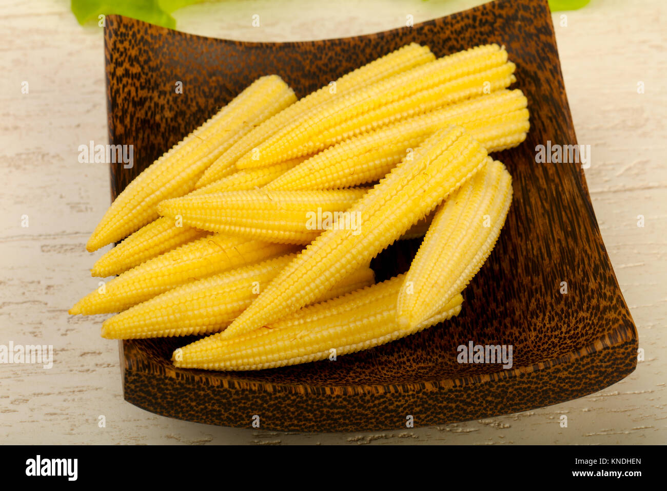 Young raw baby corn Stock Photo - Alamy