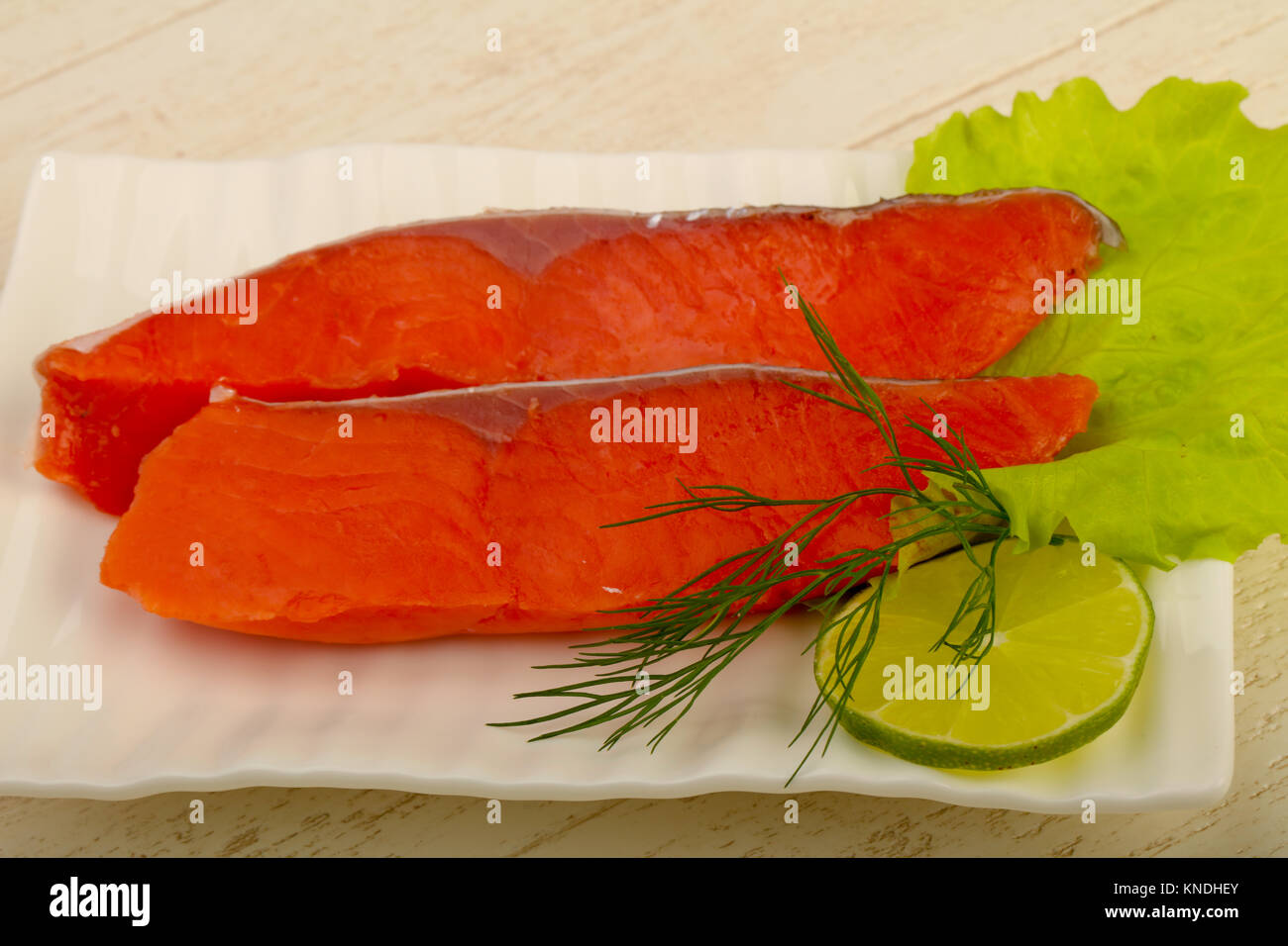 Salted salmon with lime and dill Stock Photo - Alamy