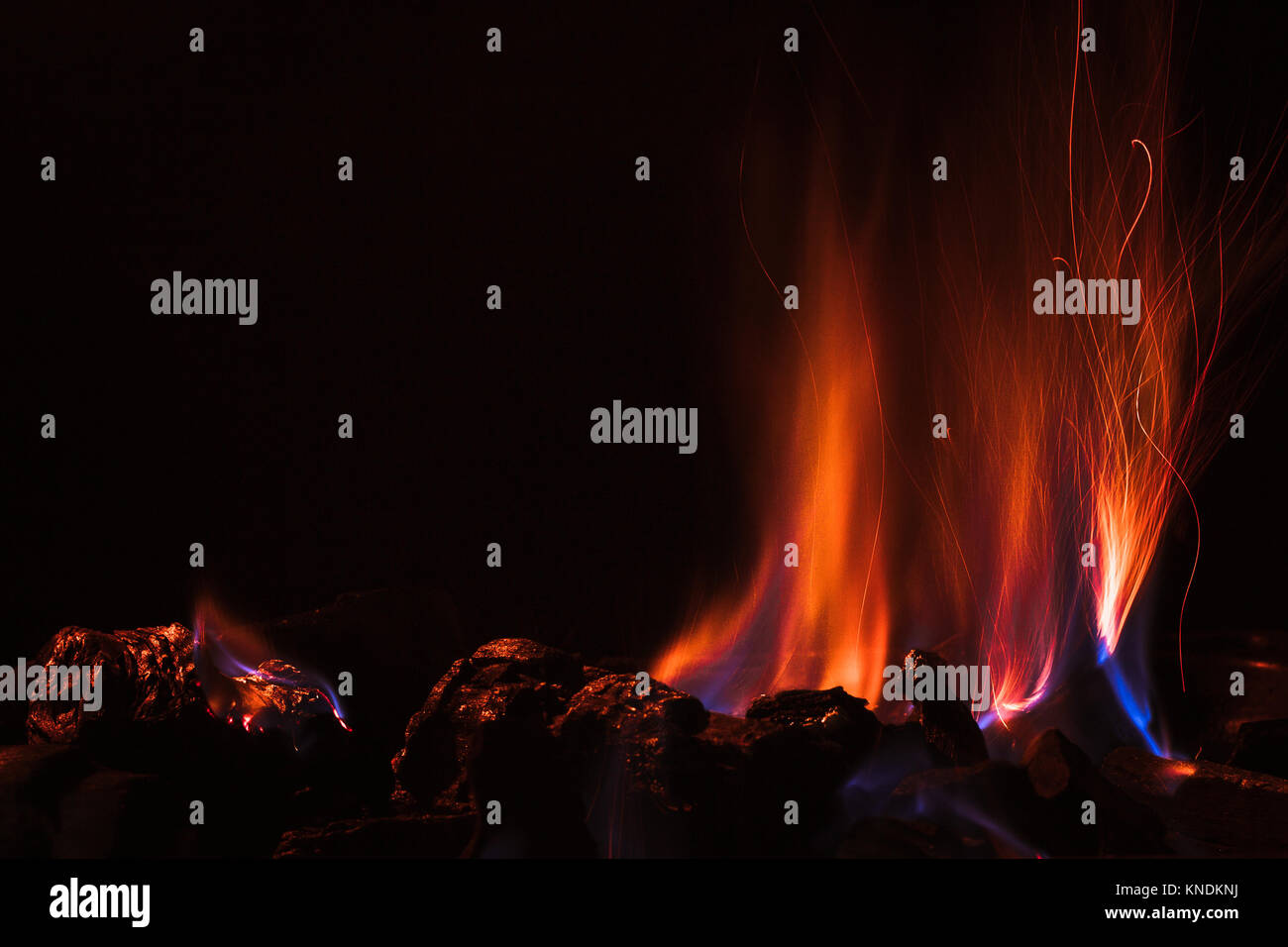 Camp fire in the dark night background Stock Photo - Alamy