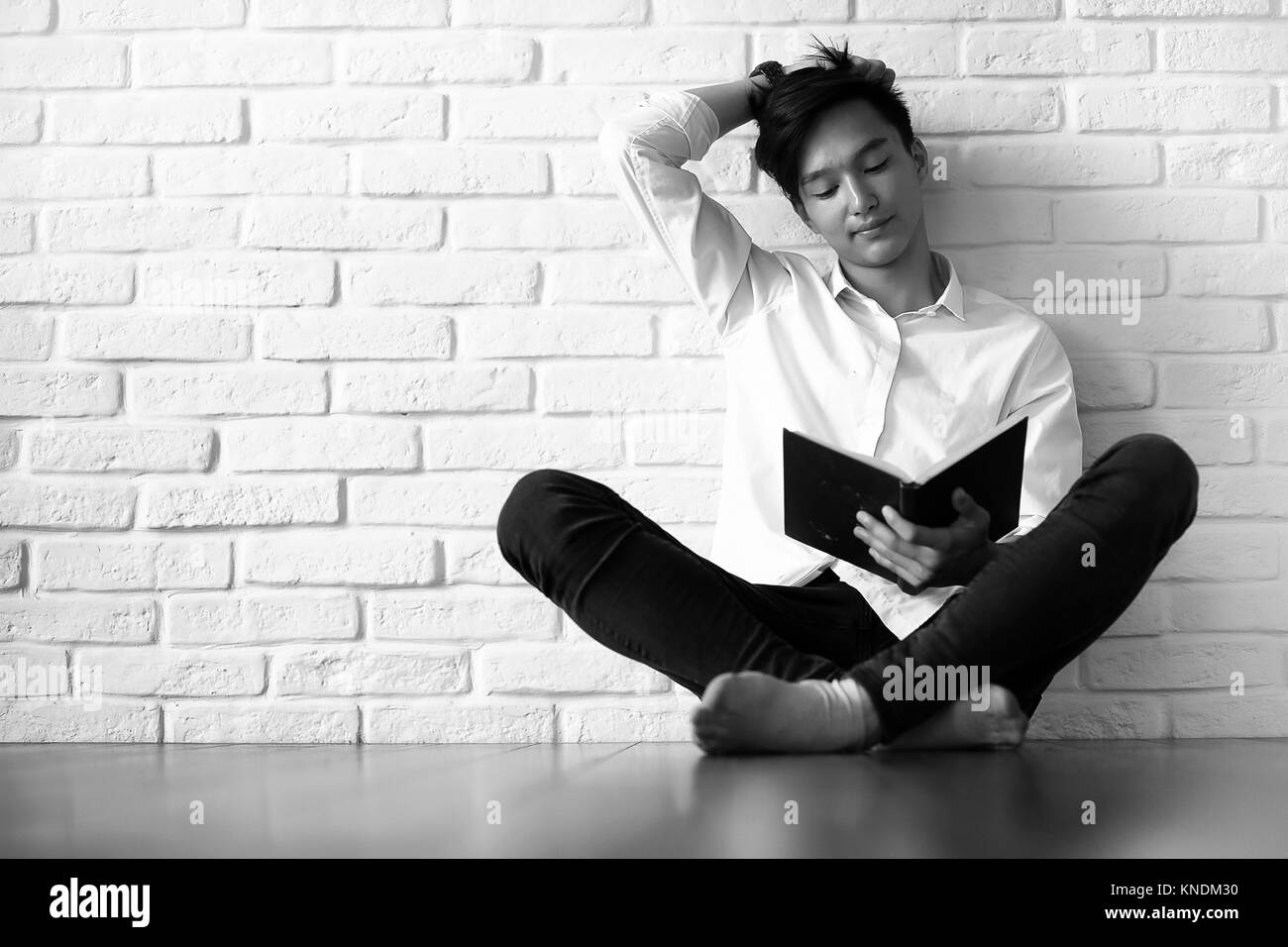 Asian student with books Stock Photo - Alamy