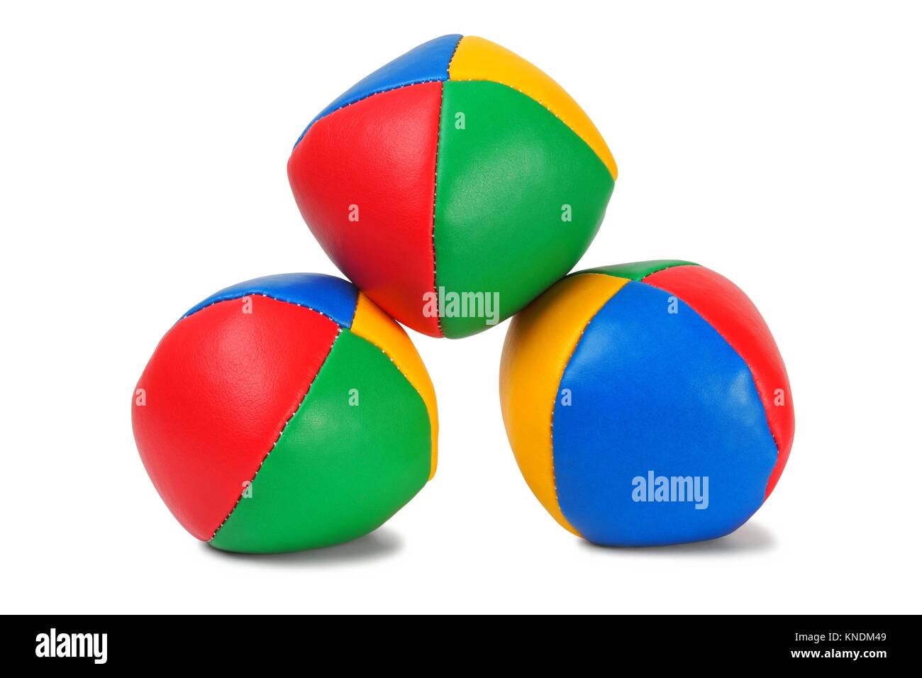 Three juggling balls on white background Stock Photo - Alamy