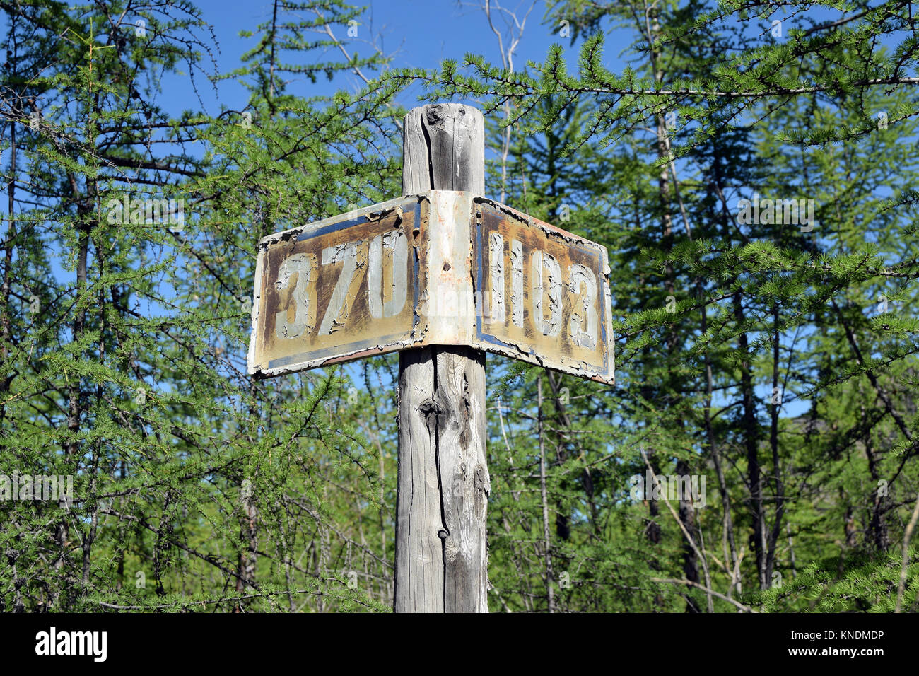 On the Kolyma highway, old road sign with mileage. This road has been ...