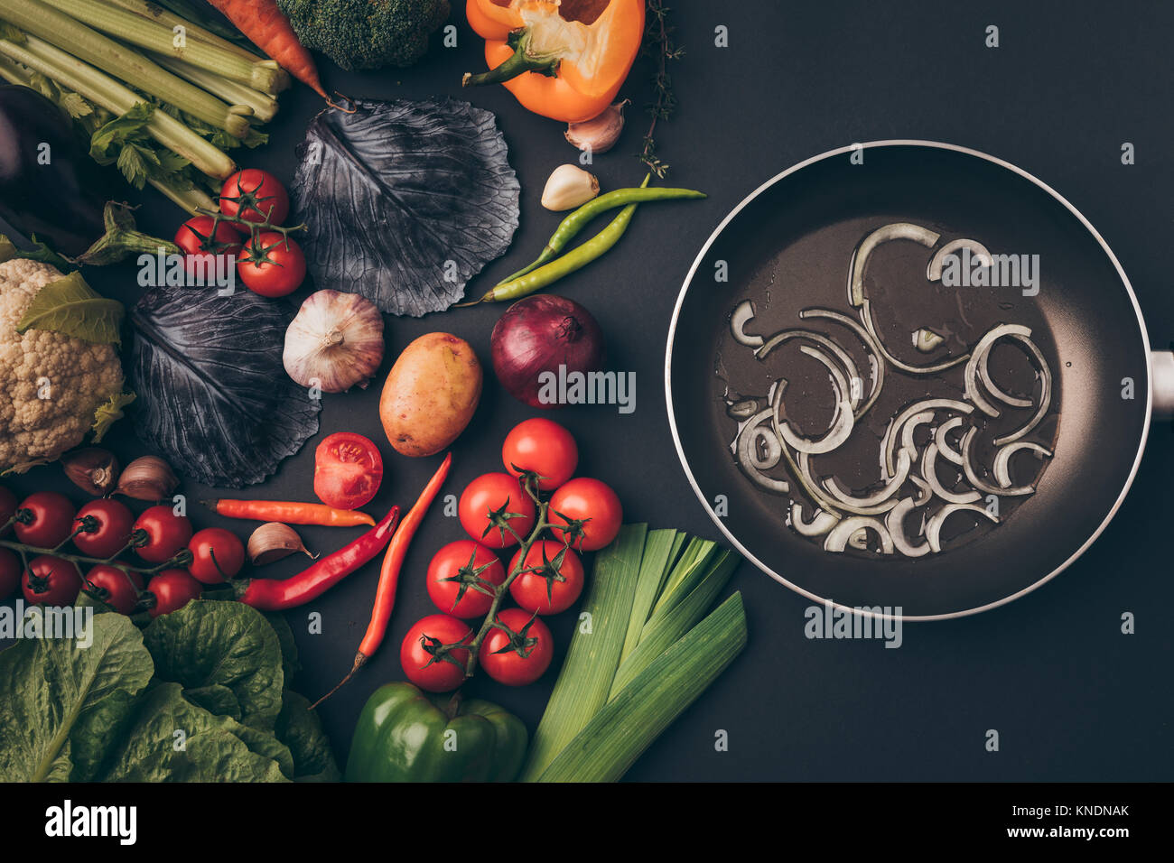 colored vegetables and frying pan Stock Photo - Alamy
