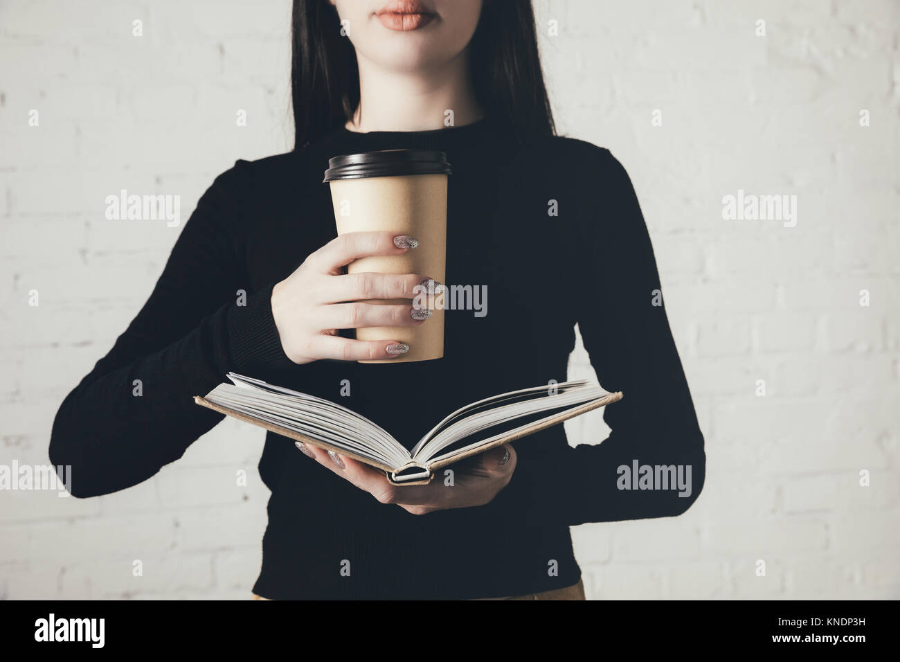 Girl drinking coffee reading book hi-res stock photography and images ...