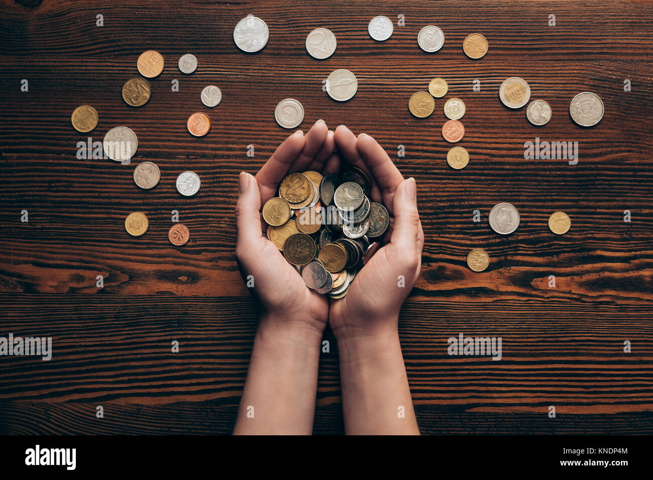 female hands with coins Stock Photo - Alamy