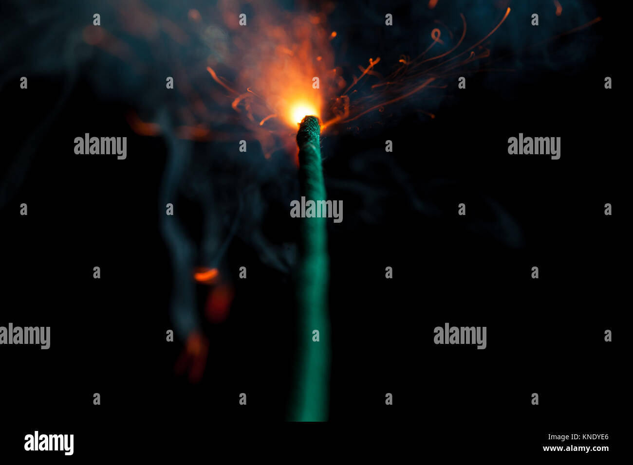 Burning fuse with sparks and grey smoke on black background Stock Photo ...