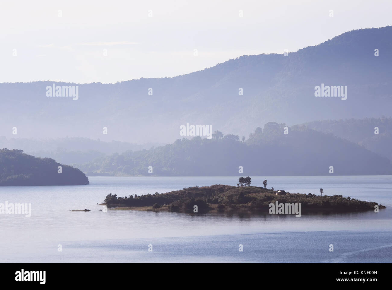 beautiful landscape with island in the middle of the sea with mountains ...