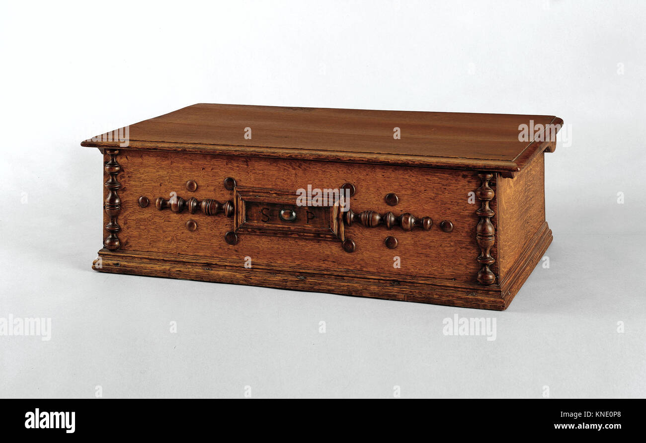 This 17th-century American box is crafted from white oak and maple. It ...